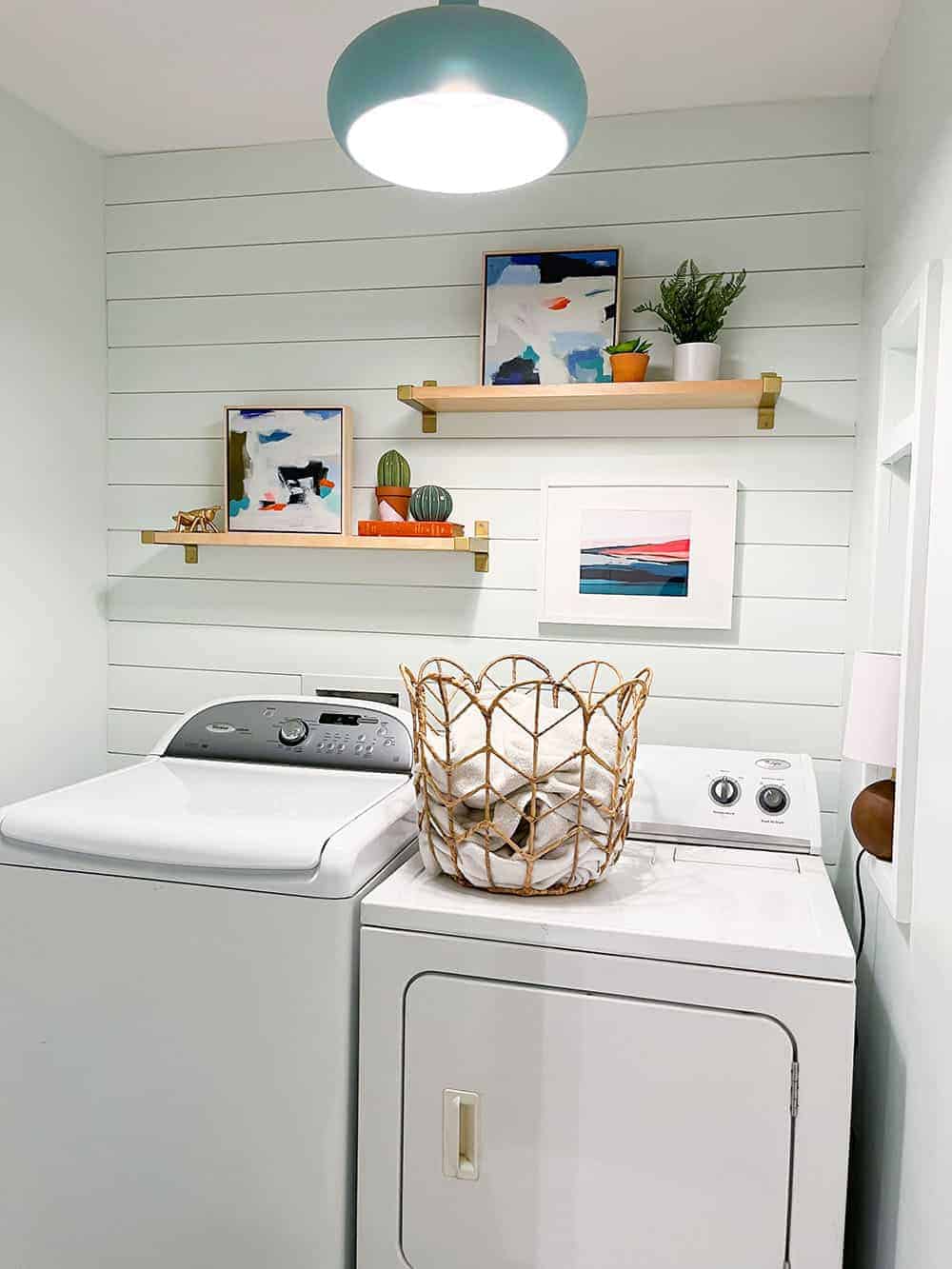 DIY laundry room update featuring Tic Tac Tiles and IKEA accessories